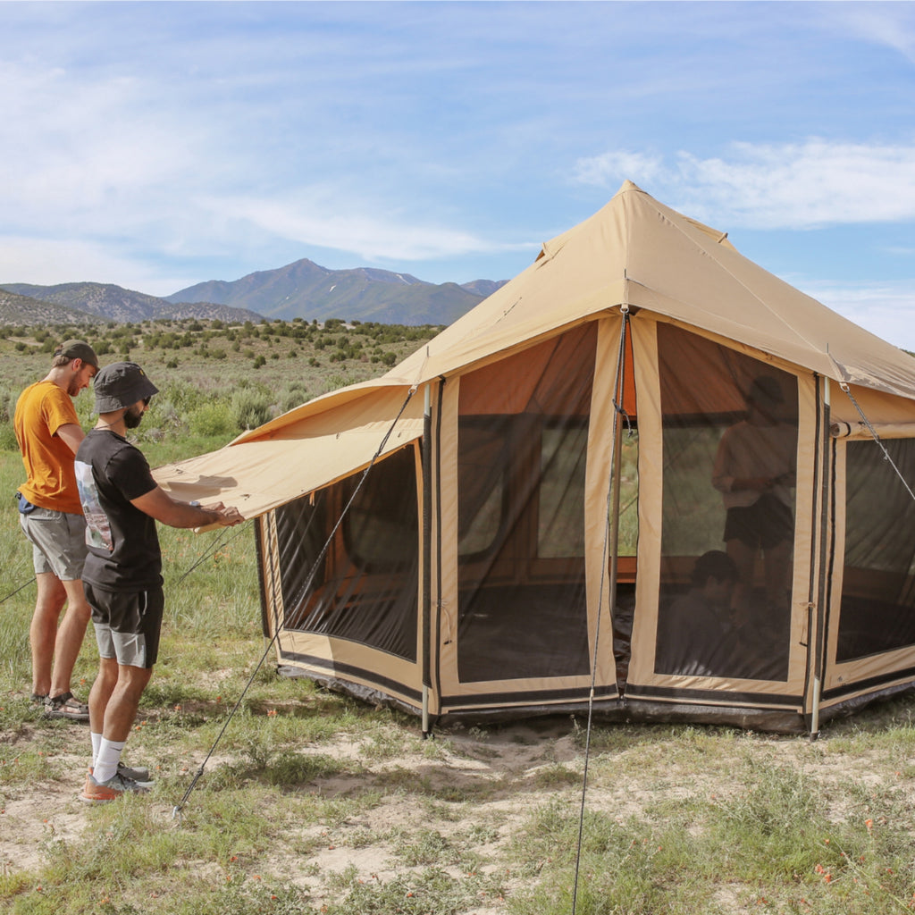 altimus bell tent's built in awning being open by two guys getting ...